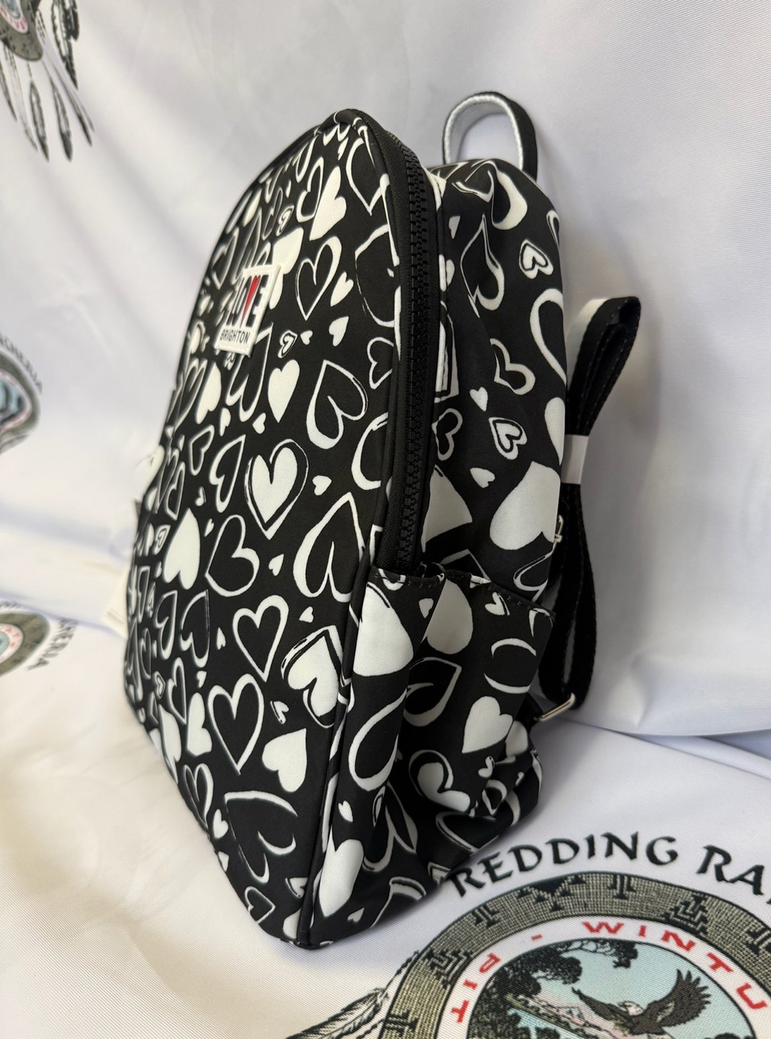 #53 Brighton #2 Backpack with Umbrella and Pearl Necklace - RRCF Auction